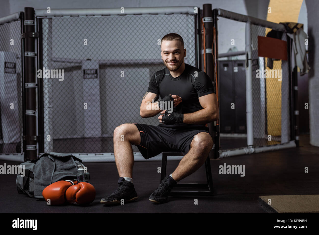 boxer wrapping hands with bandages Stock Photo - Alamy