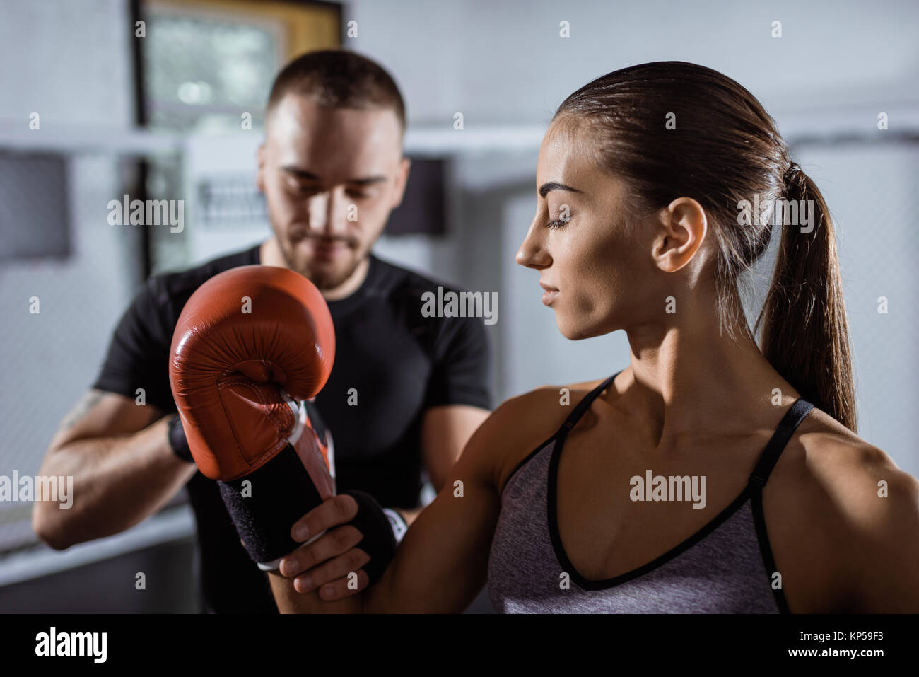 trainer and female boxer Stock Photo - Alamy