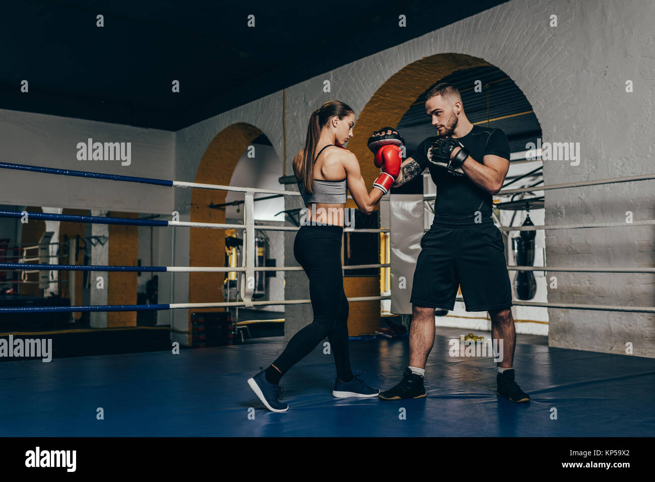 boxers training on boxing ring Stock Photo - Alamy