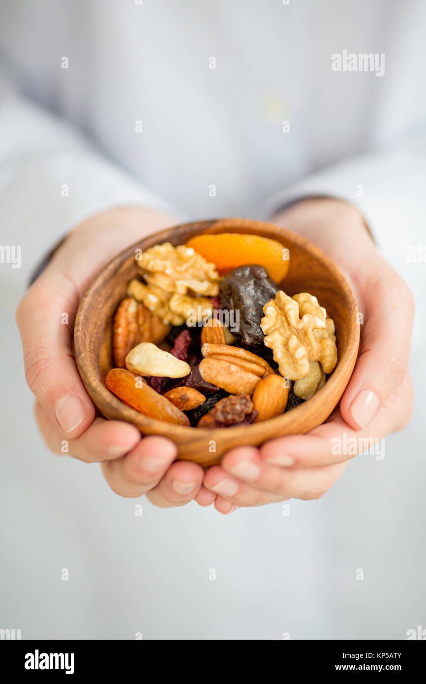 Person eating nuts hi-res stock photography and images - Alamy