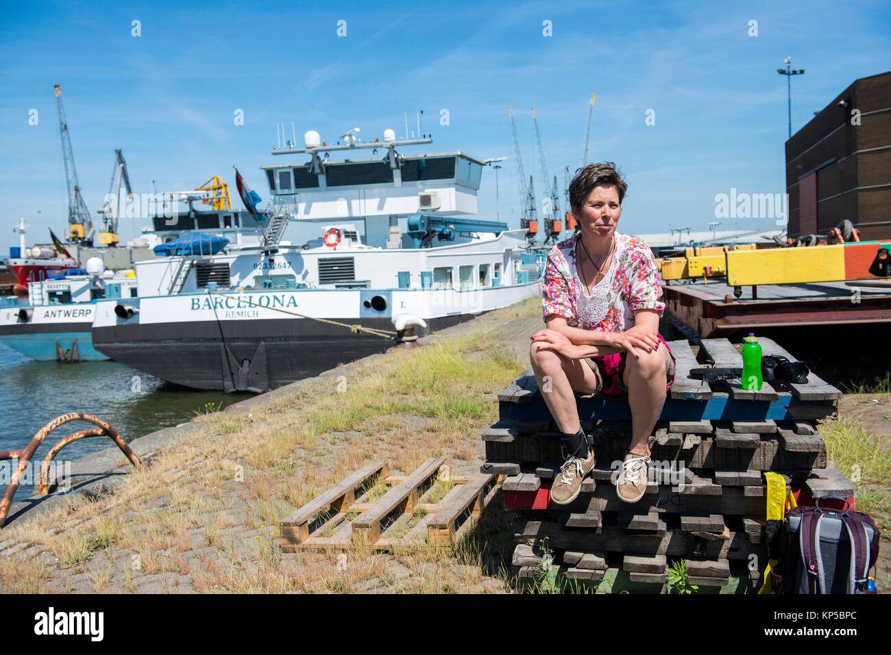 Merwehaven, Rotterdam. Taking a break on a stack of pallets during a ...