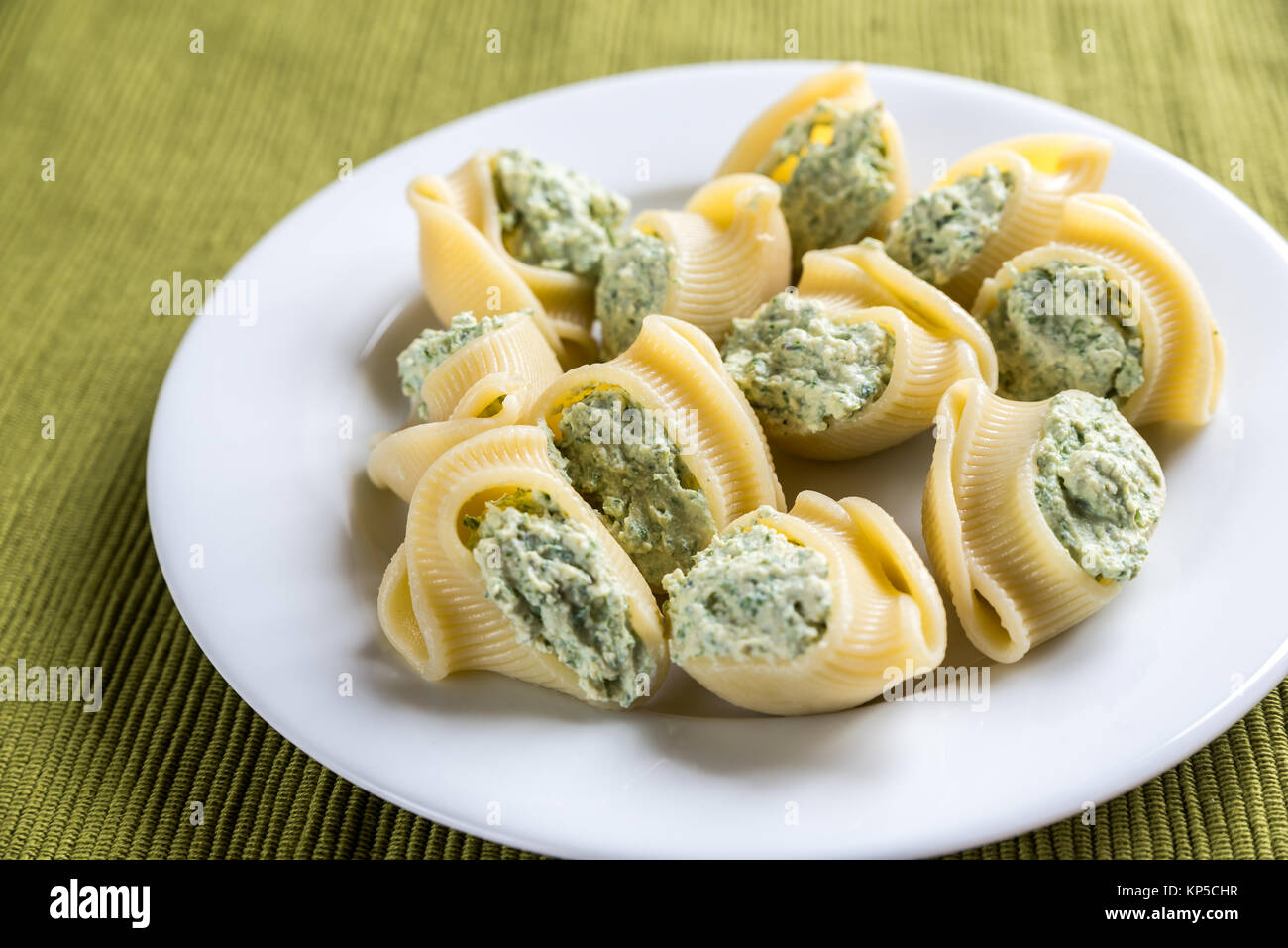 Stuffed lumaconi with cheese Stock Photo - Alamy