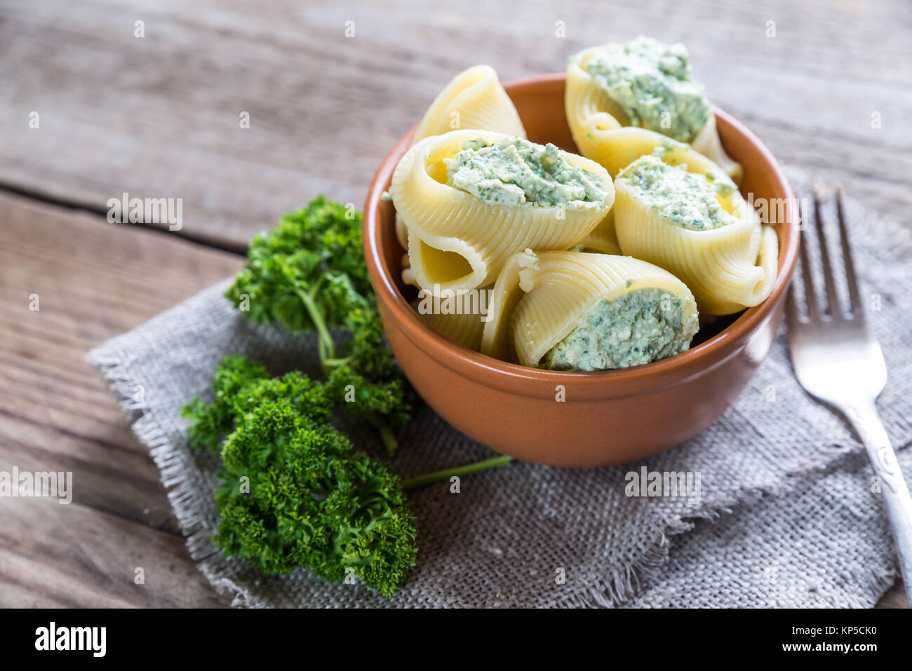 Stuffed lumaconi with cheese Stock Photo - Alamy
