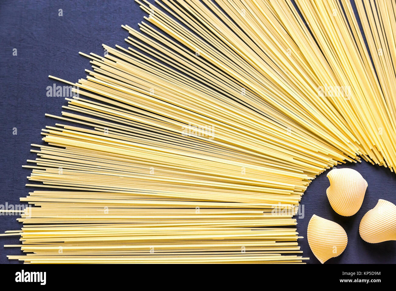 Spaghetti pasta on the dark background Stock Photo - Alamy