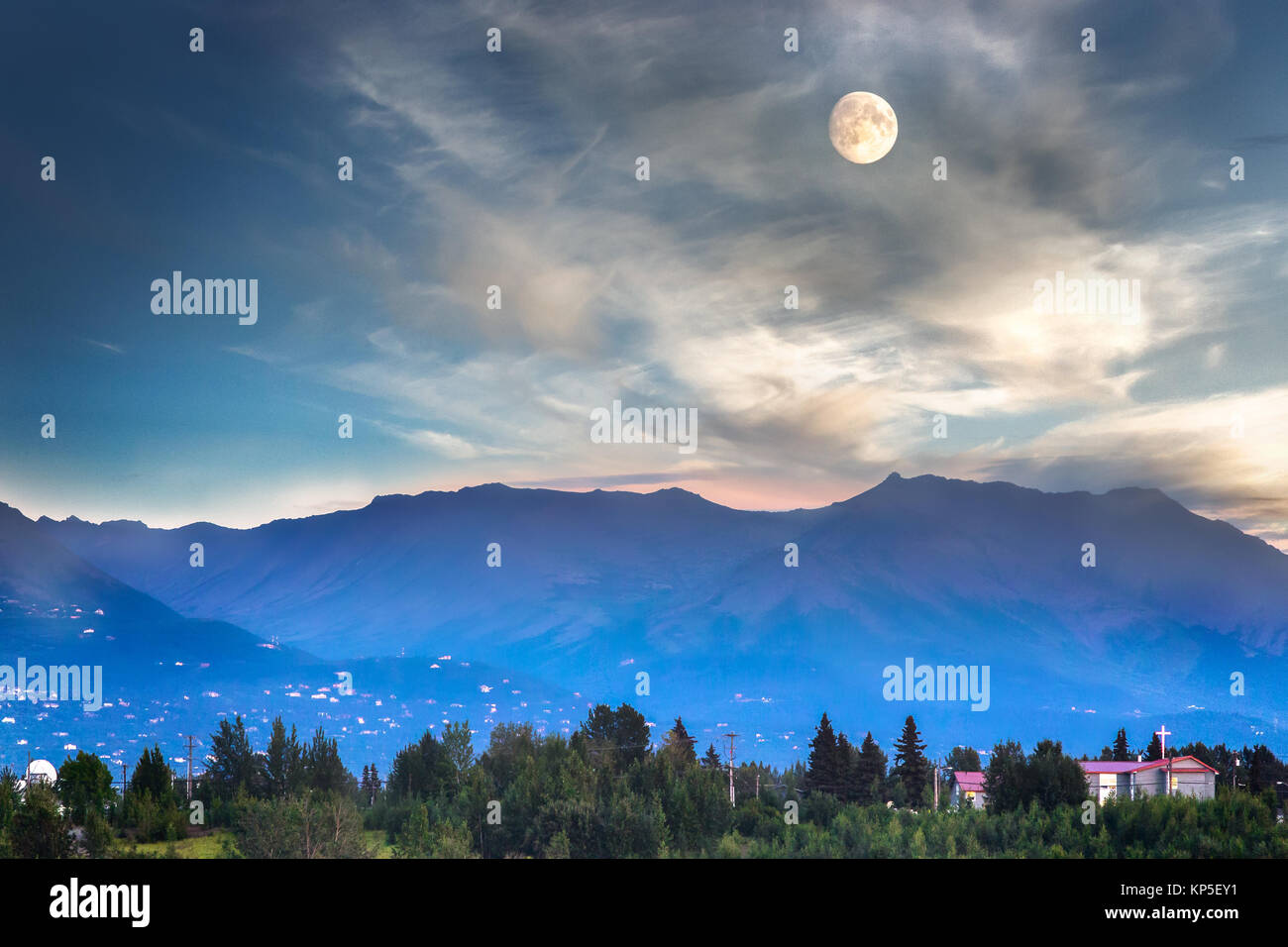Full moon and mountains near by the Port Of Anchorage in Alaska, USA ...