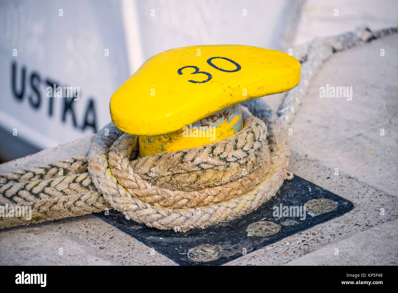 bollard in port Stock Photo - Alamy