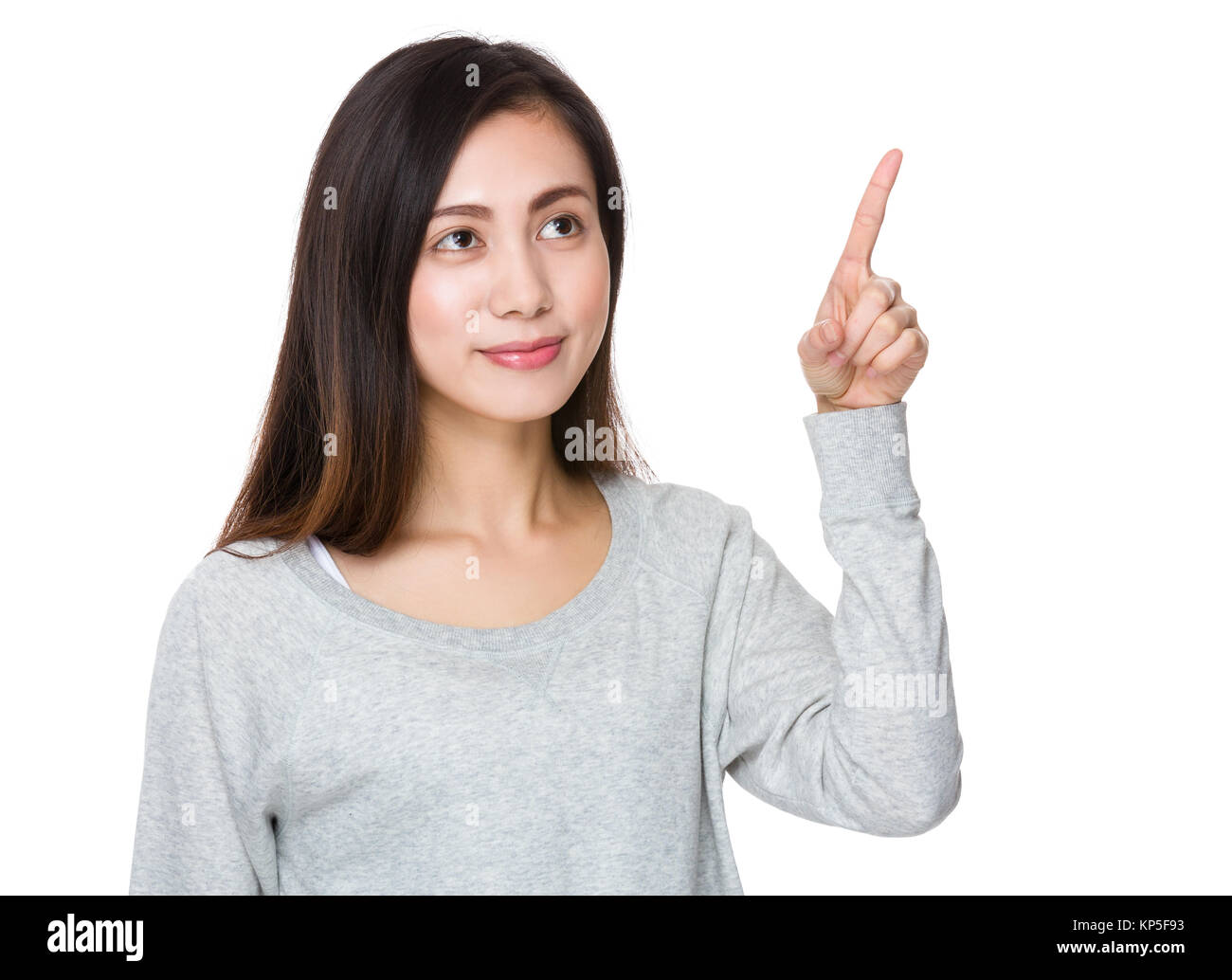 Young Woman with finger touch on the imaginary panel Stock Photo - Alamy