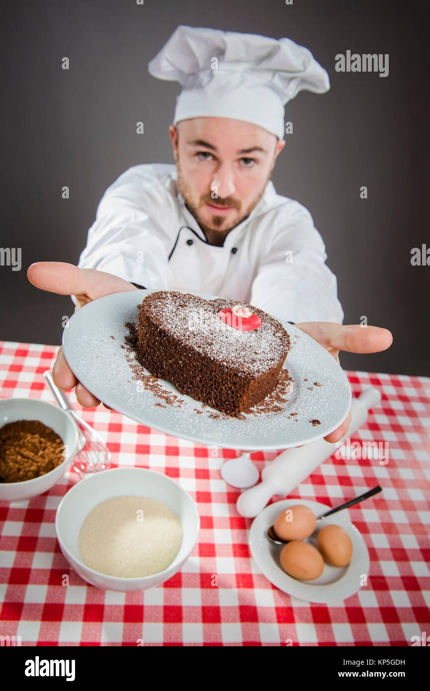 Kuchenbaecker - cake baker Stock Photo - Alamy
