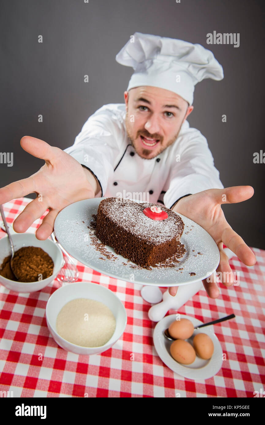 Kuchenbaecker - cake baker Stock Photo - Alamy