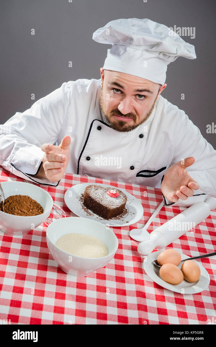 Kuchenbaecker - cake baker Stock Photo - Alamy