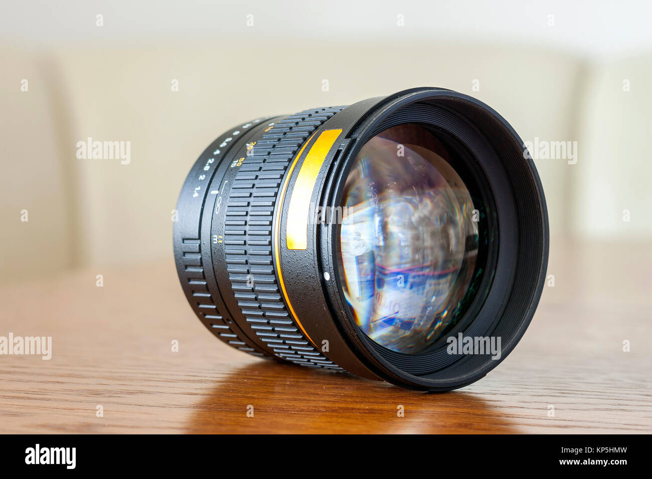 Camera portrait fix focus photo lens on dark wooden background Stock ...