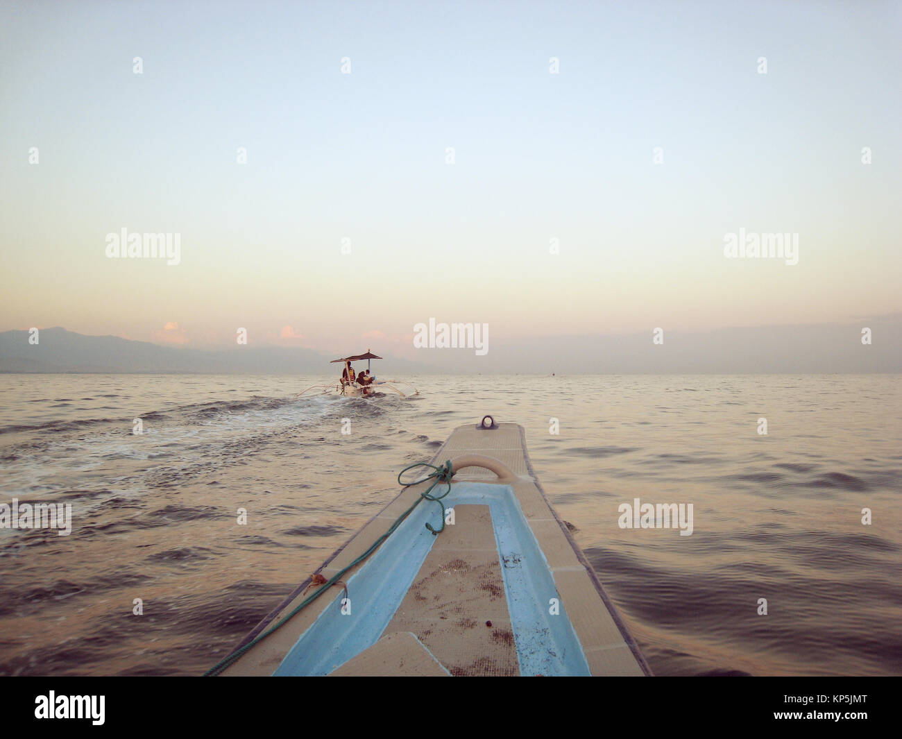 Boat spider legs for viewing dolphins in Bali Stock Photo - Alamy