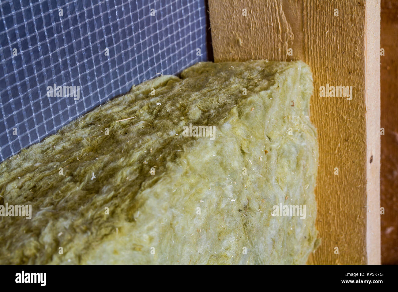 Thermal insulation mineral rock wool installation at the new building ...