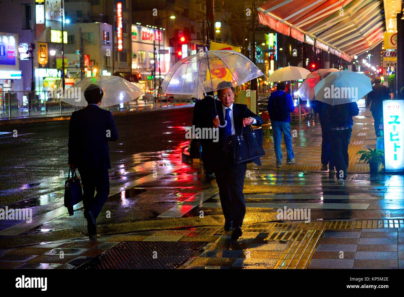 Man walking japan hi-res stock photography and images - Alamy