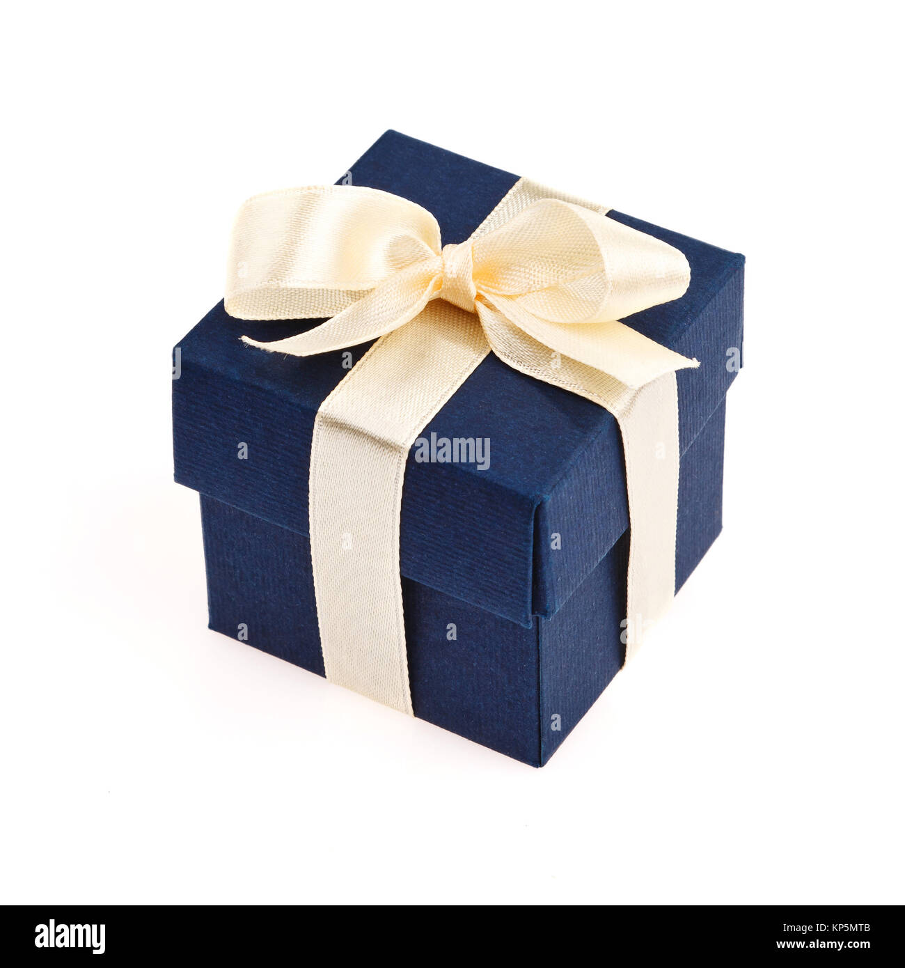 dark blue gift box with golden ribbon and bow isolated on white top ...