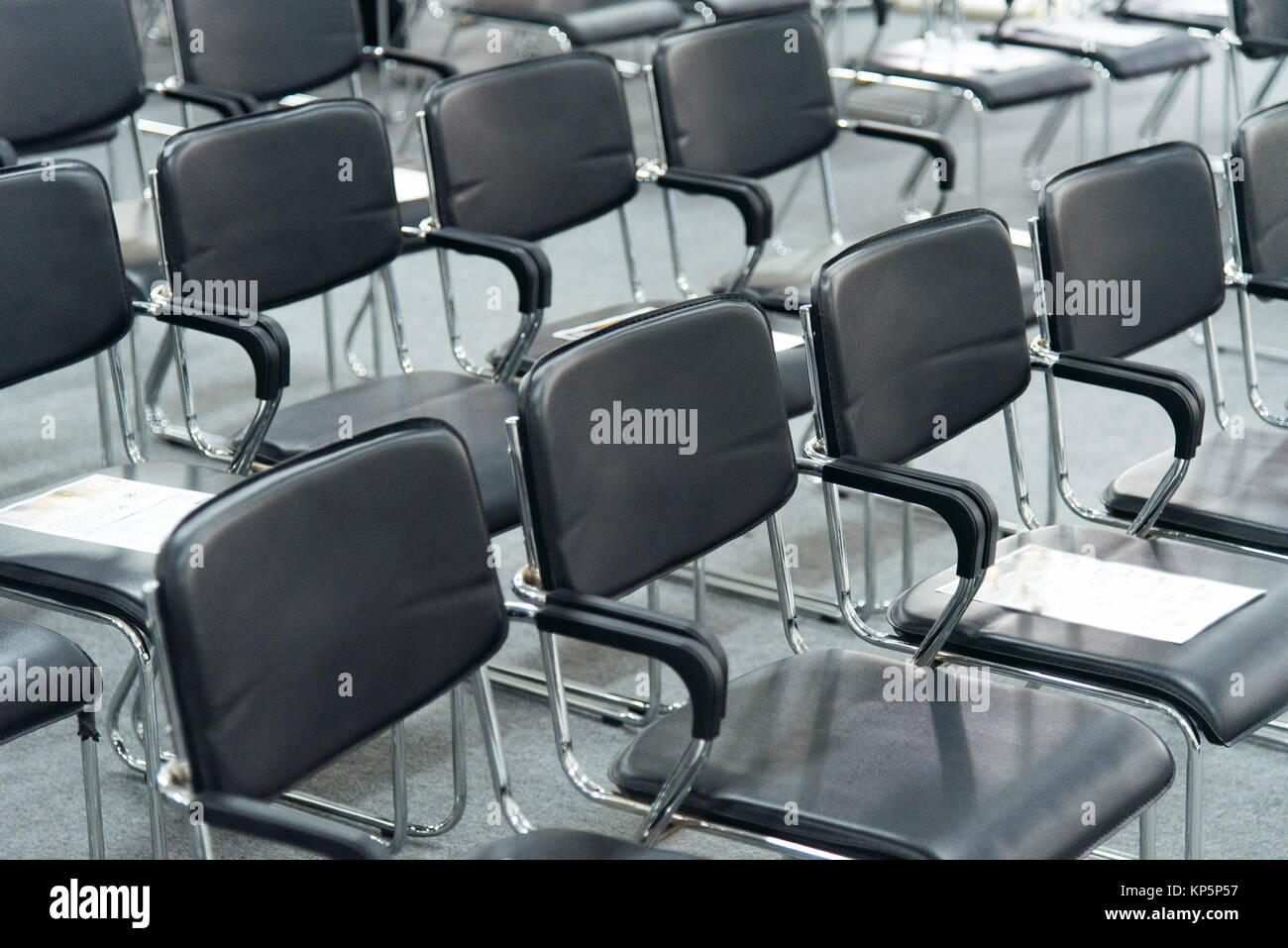 conference hall with Black empty chairs in row Stock Photo - Alamy
