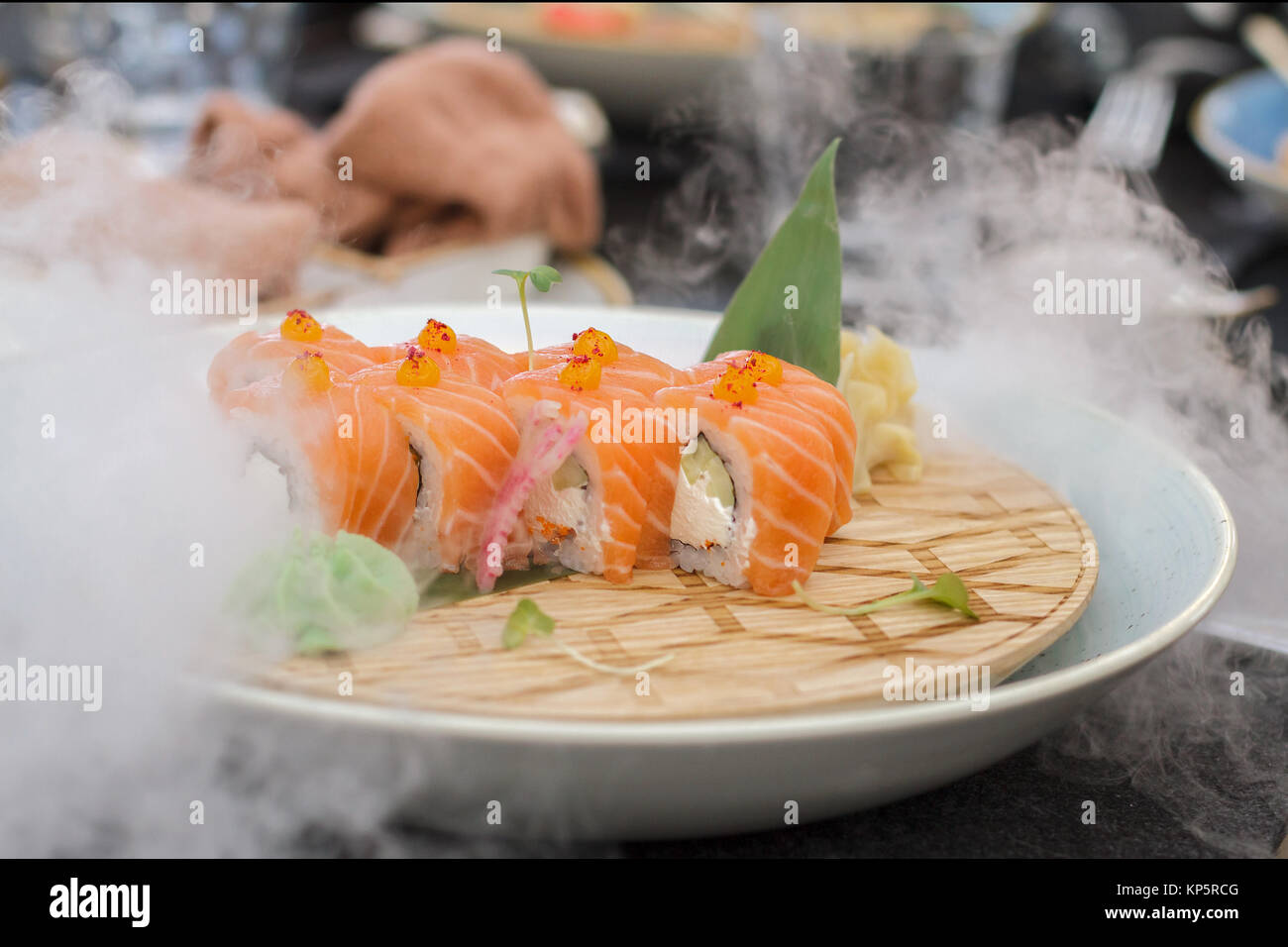 Fresh sushi on a platter is cooled with ice Stock Photo - Alamy