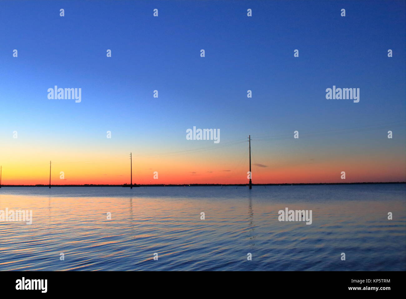 Power line in the sea - Florida - USA Stock Photo - Alamy