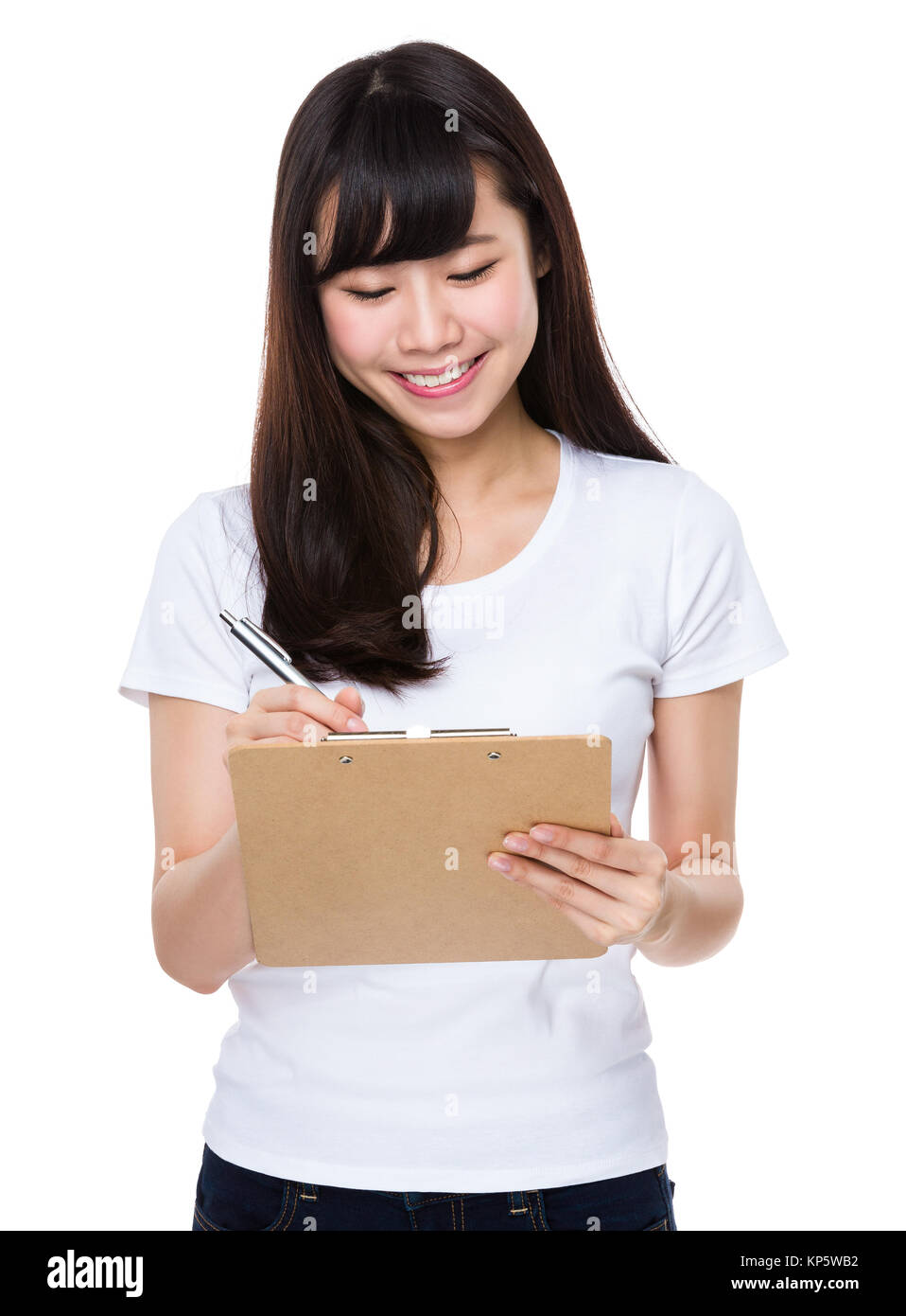 Young student take note on clipboard Stock Photo - Alamy