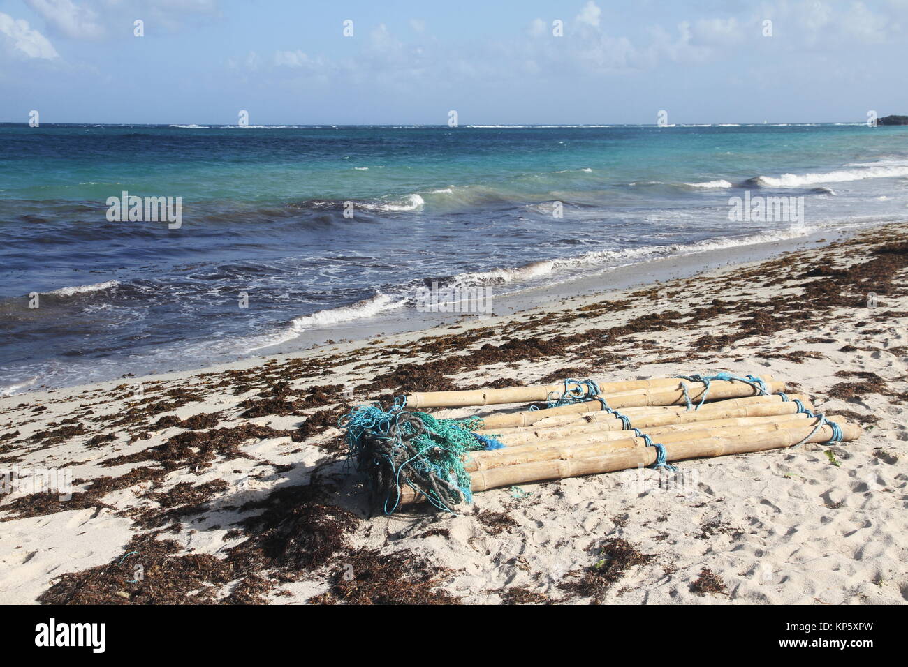 Raft on a caribbean beach Stock Photo - Alamy
