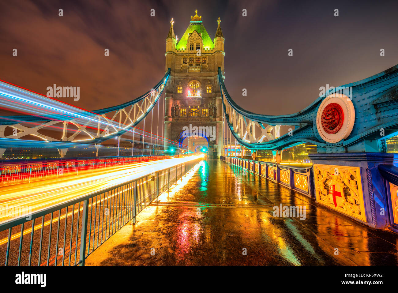 Night view of Tower Bridge with traffic light trail, London, UK Stock ...