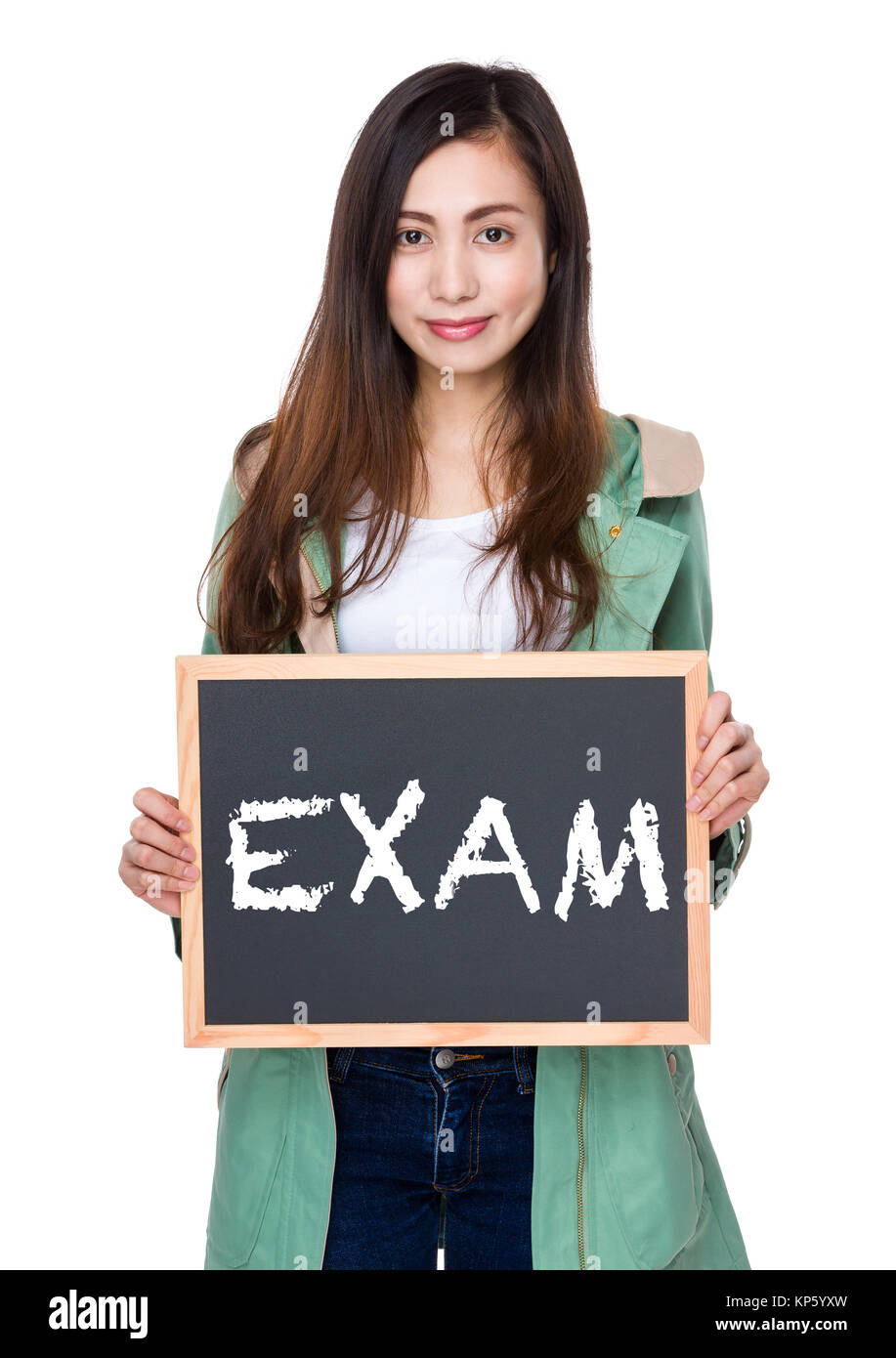 Woman hold with blackboard showing a word exam Stock Photo - Alamy