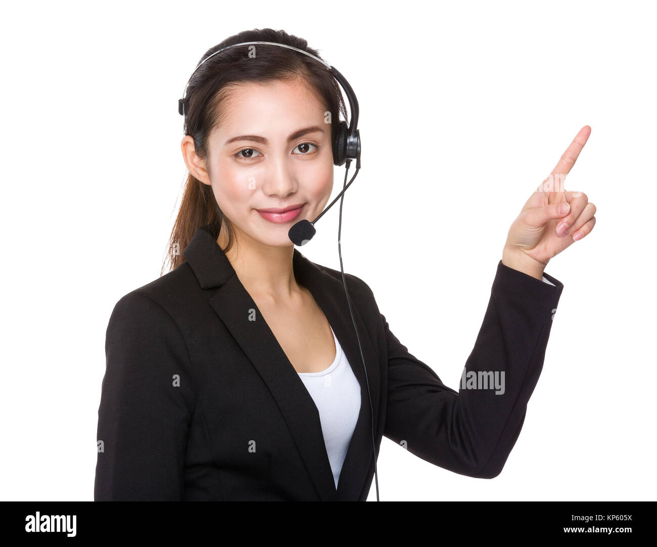 Customer services officer with finger point up Stock Photo - Alamy