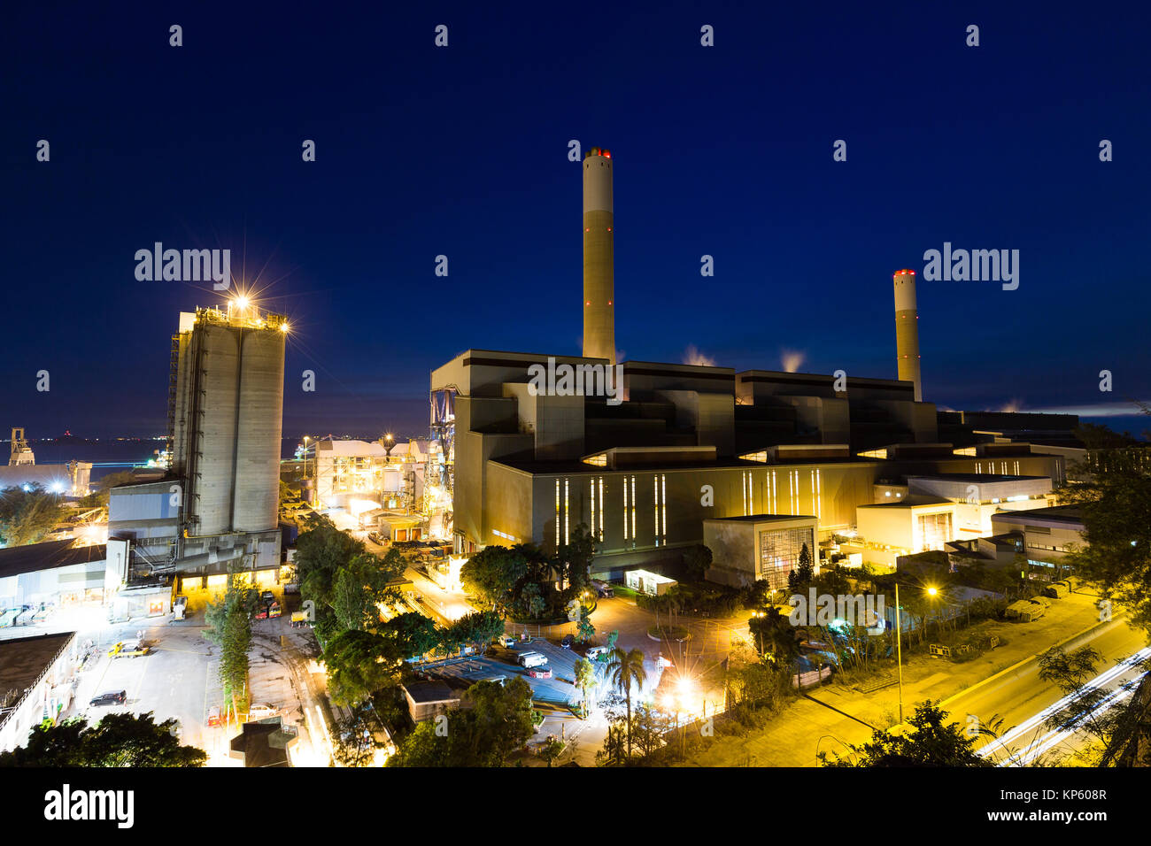 Cement factory at night Stock Photo - Alamy