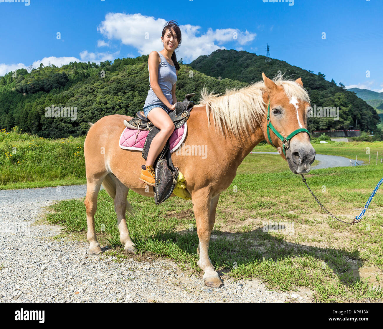 Chinese girl horse riding hi-res stock photography and images - Alamy