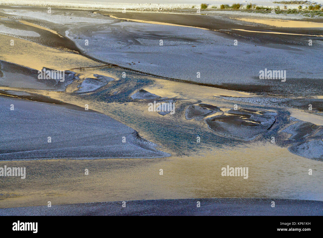 Abstract natural picture of the river bed, the surface of the water ...