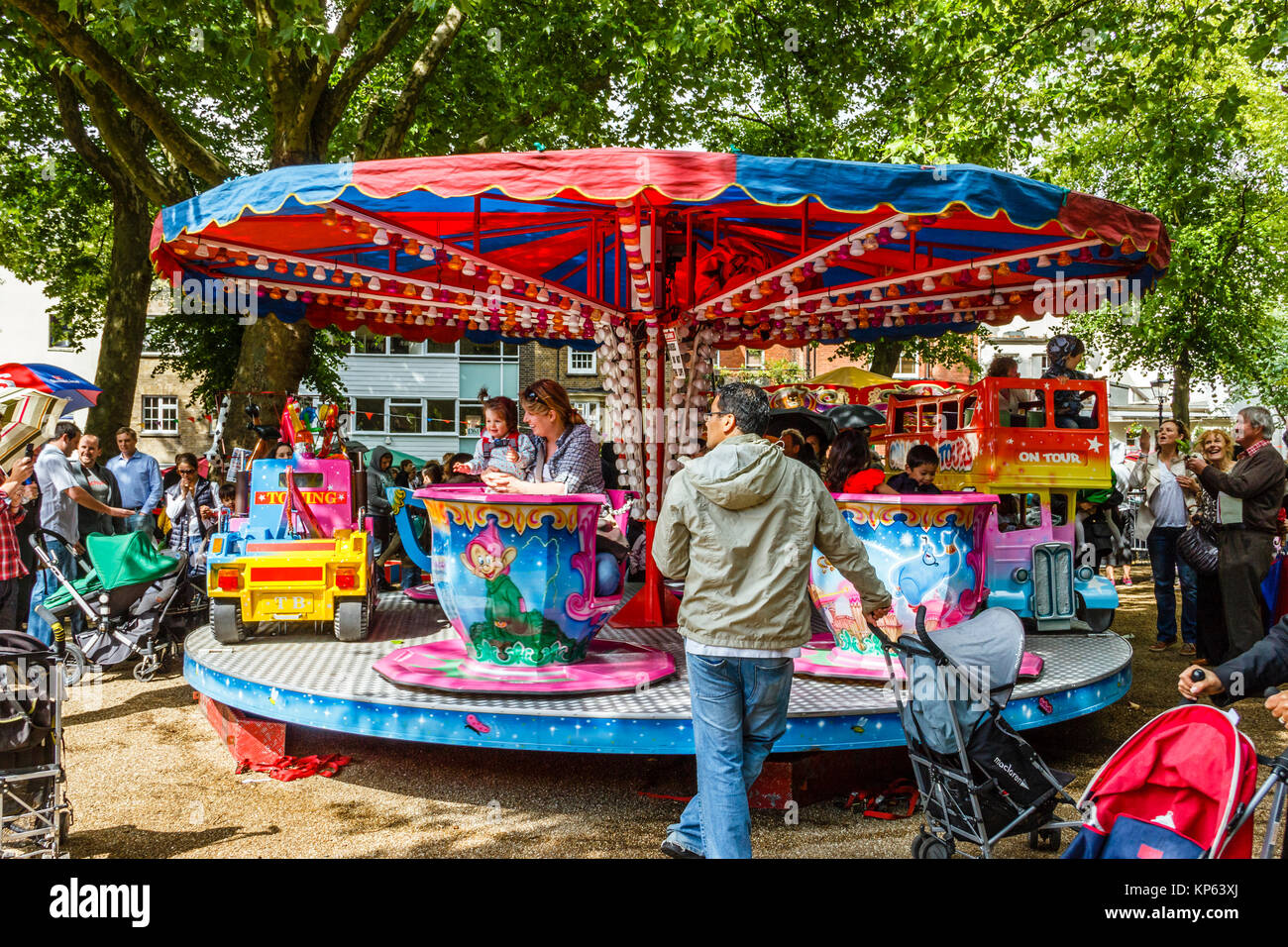 Children's carousel at the Fair in the Square, Pond Square, Highgate ...