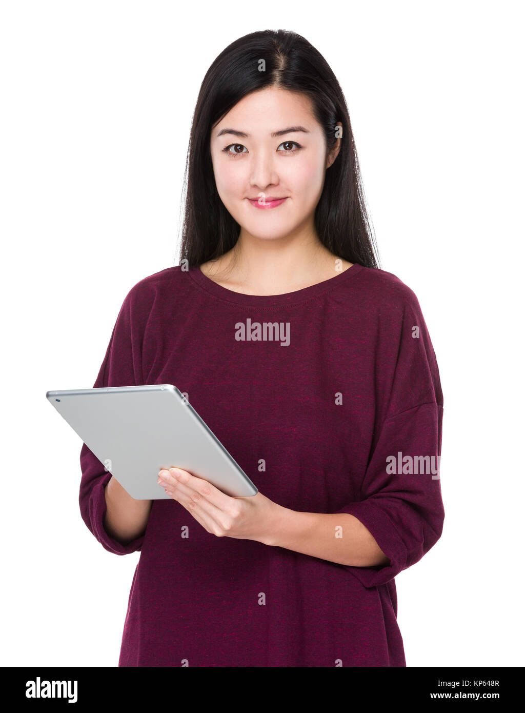 Asian woman use of tablet Stock Photo - Alamy