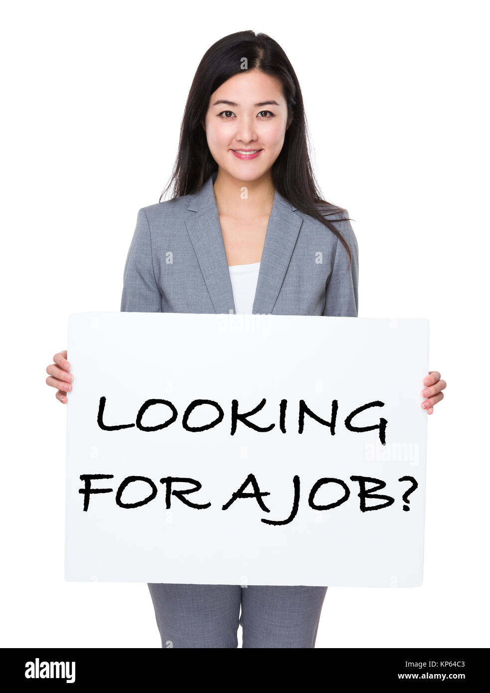 Beautiful businesswoman holding a poster showing with looking for a job ...