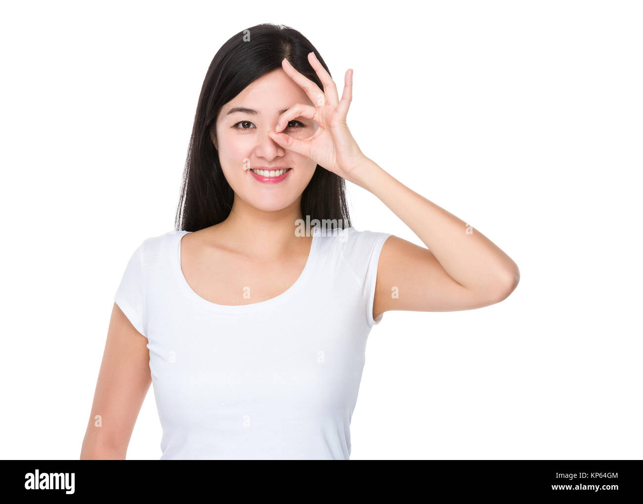 Asian woman with ok sign gesture on her eye Stock Photo - Alamy