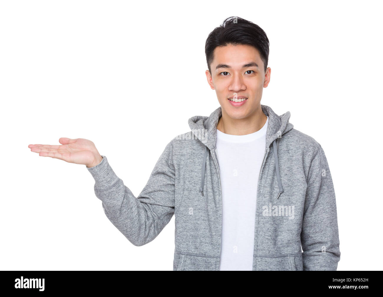 Asian man with open hand palm Stock Photo - Alamy