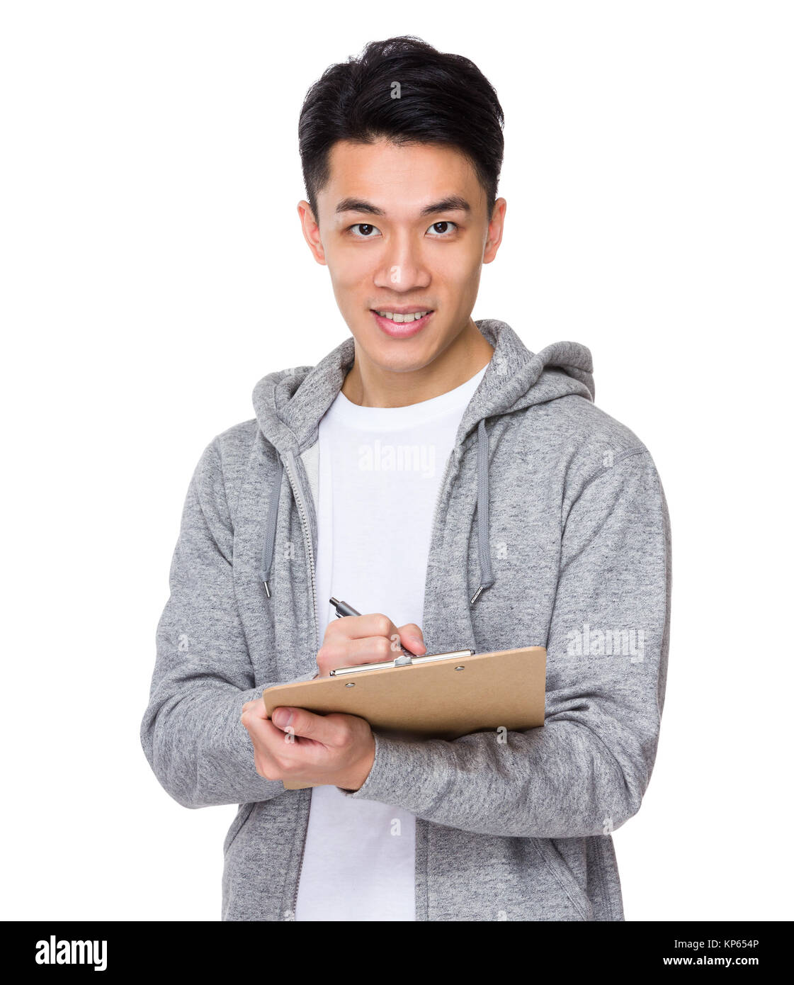 Man take note on clipboard Stock Photo - Alamy