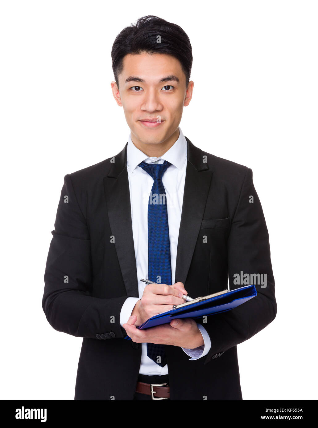 Young businessman take note on clipboard Stock Photo - Alamy