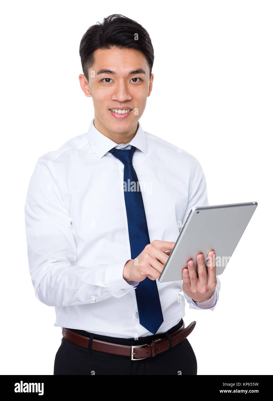 Asian businessman use of tablet pc Stock Photo - Alamy