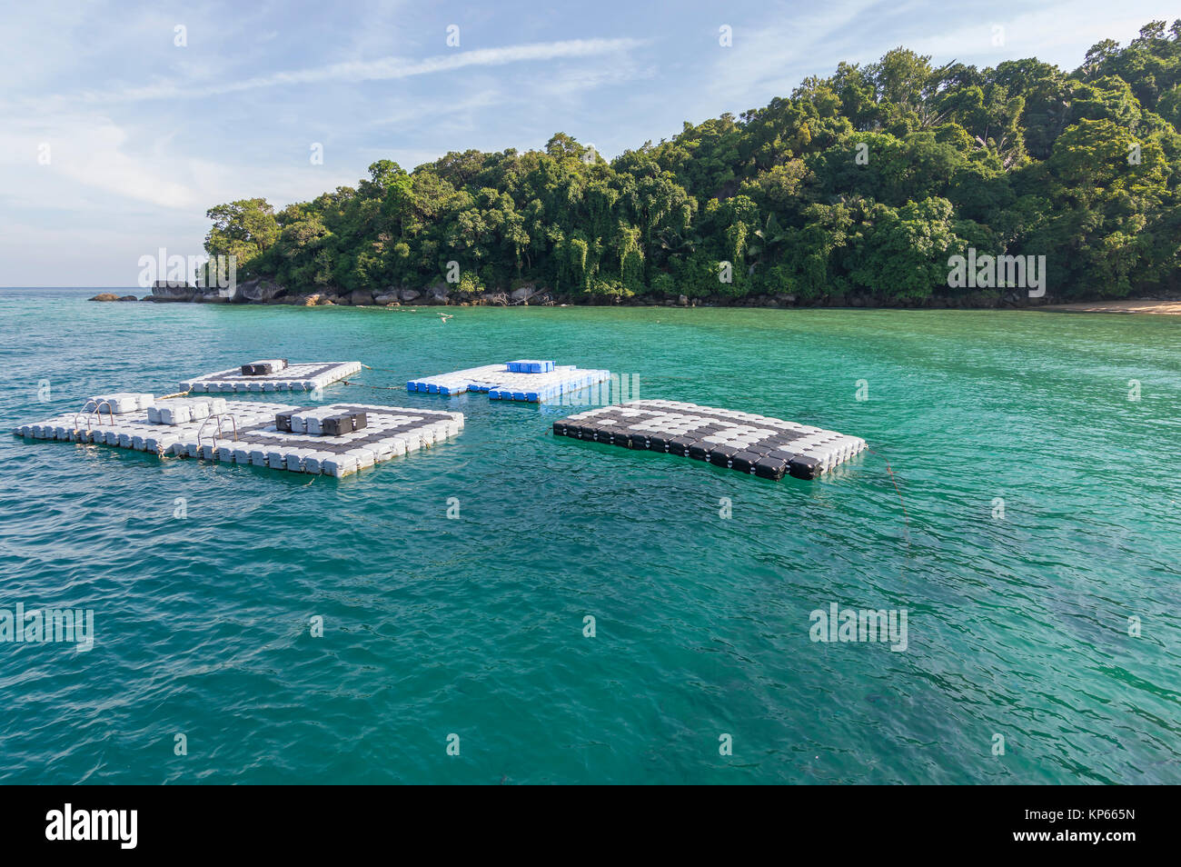 Empty swim platform floating on a lake Stock Photo - Alamy