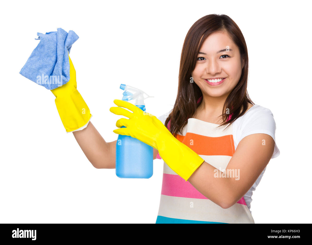 Asian housewife using the spray and rag Stock Photo - Alamy