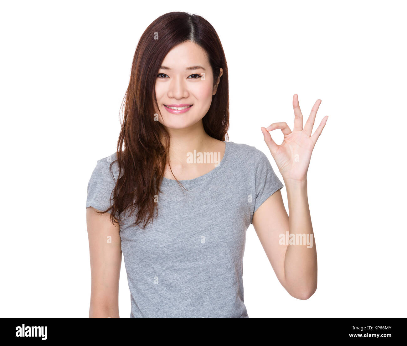 Woman with ok sign gesture Stock Photo - Alamy