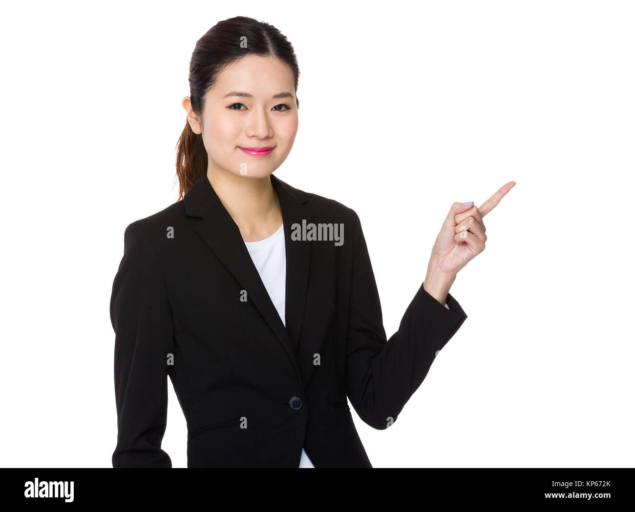 Confident Businesswoman with finger point up Stock Photo - Alamy