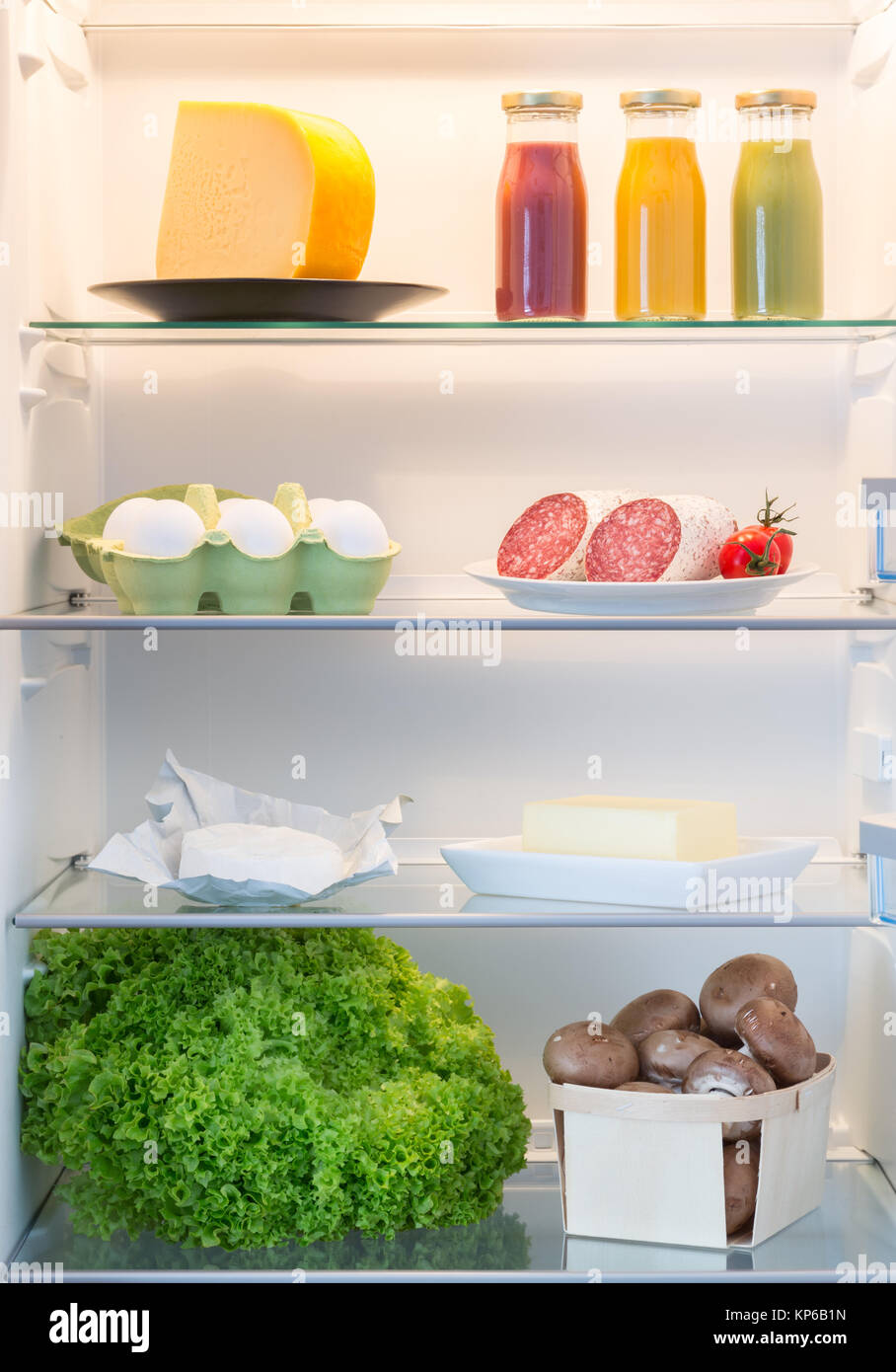 Open fridge filled with food Stock Photo - Alamy