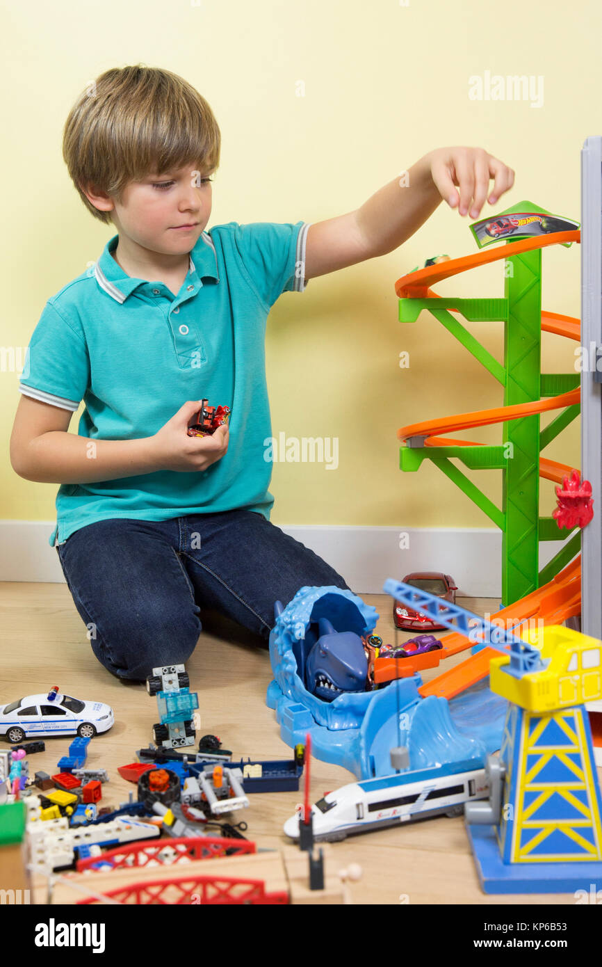 Children playing with toy cars hi-res stock photography and images - Alamy