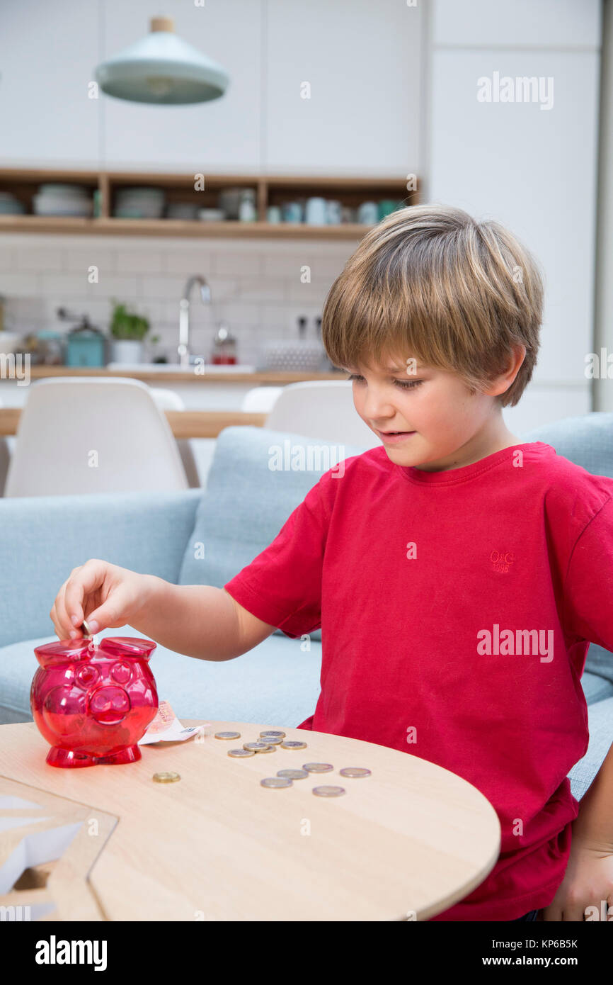 CHILD WITH MONEY Stock Photo - Alamy