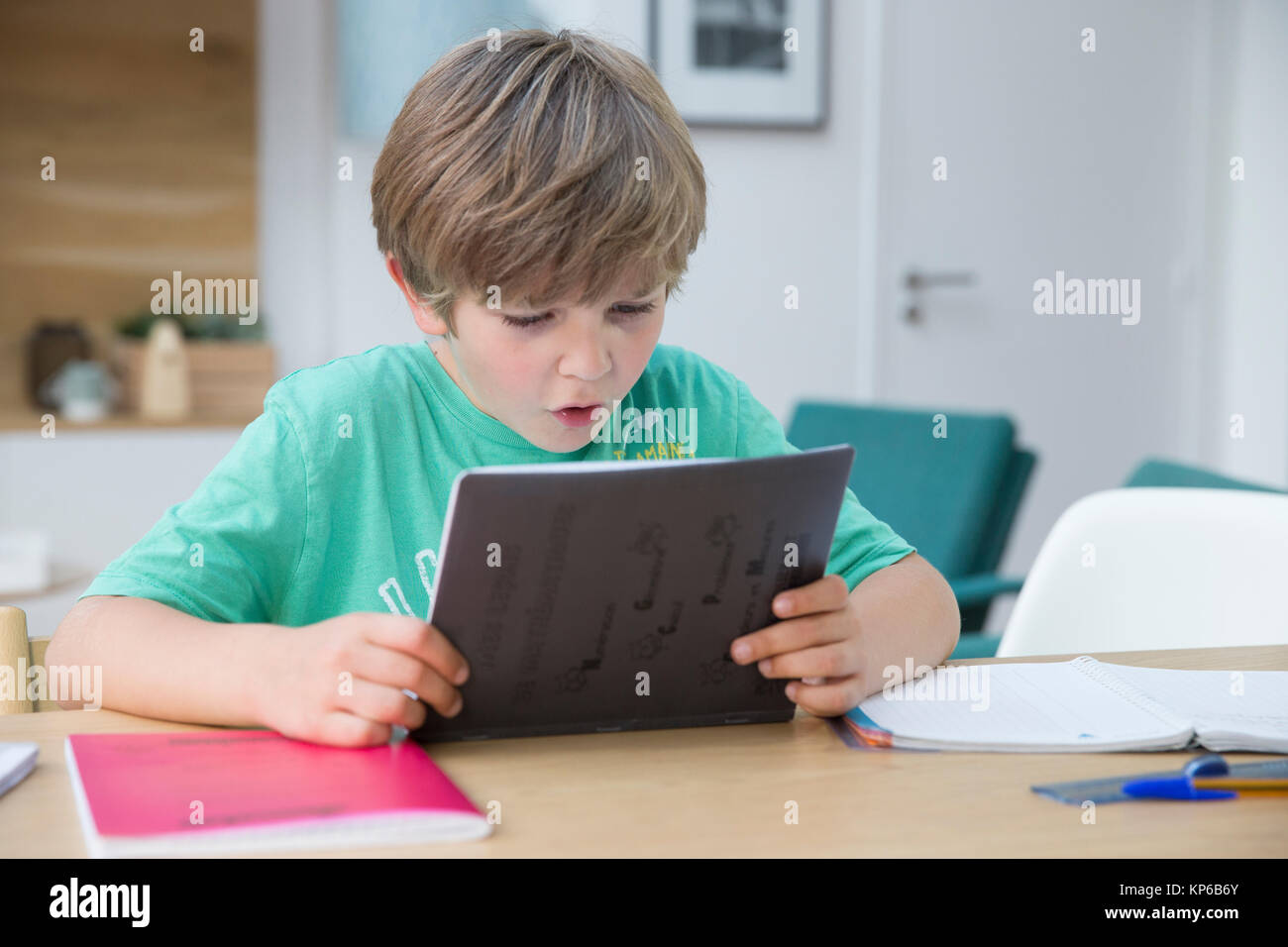 CHILD DOING HOMEWORK Stock Photo - Alamy