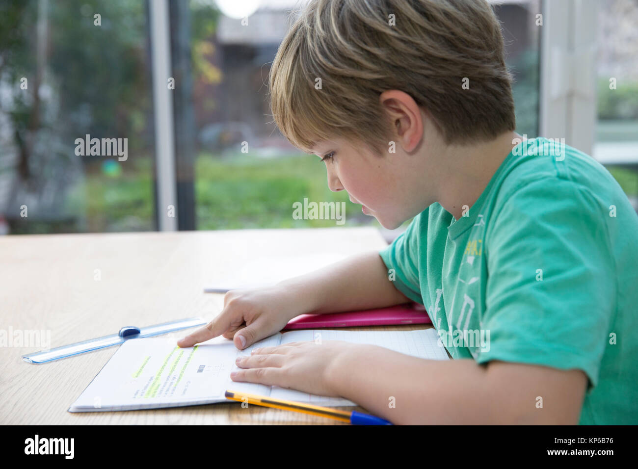 CHILD DOING HOMEWORK Stock Photo - Alamy