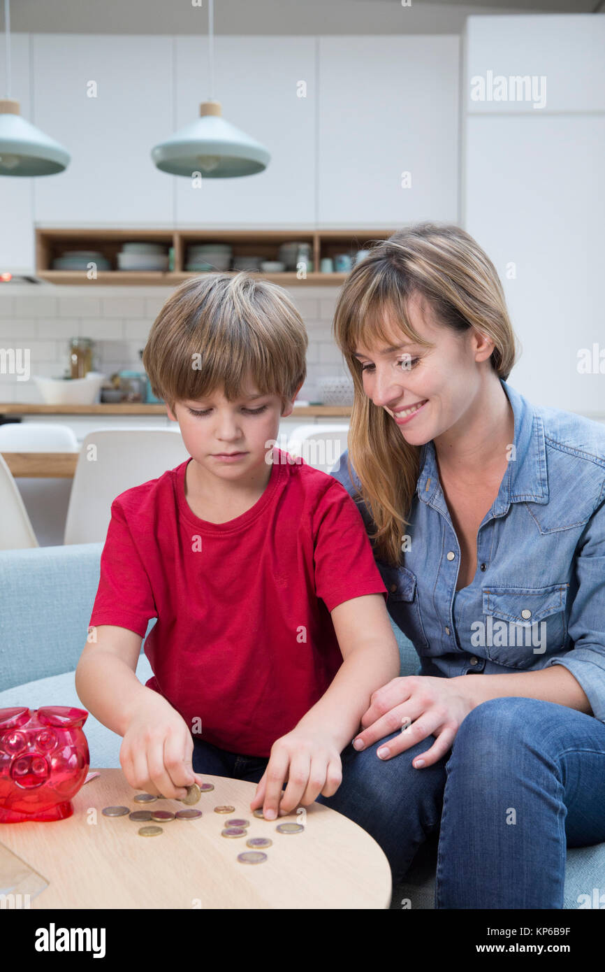 CHILD WITH MONEY Stock Photo - Alamy