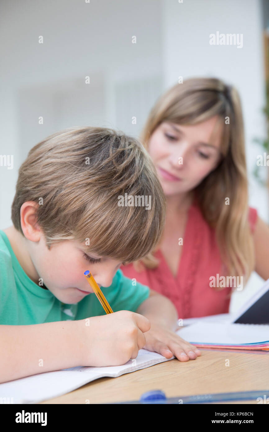 CHILD DOING HOMEWORK Stock Photo - Alamy