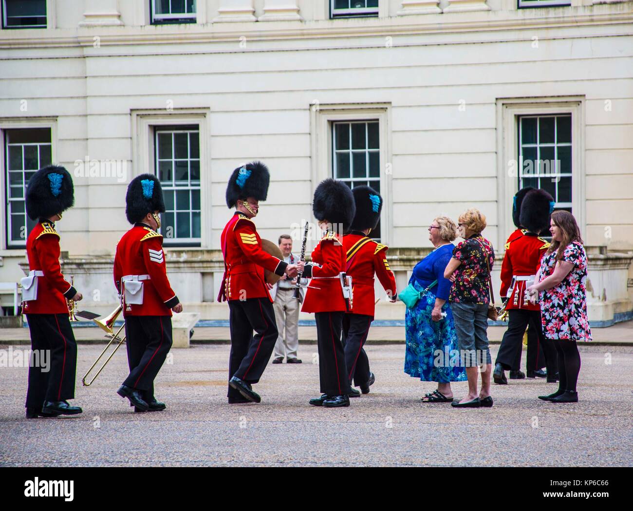 British Royal guards perform the Changing of the Guard in Buckingham ...